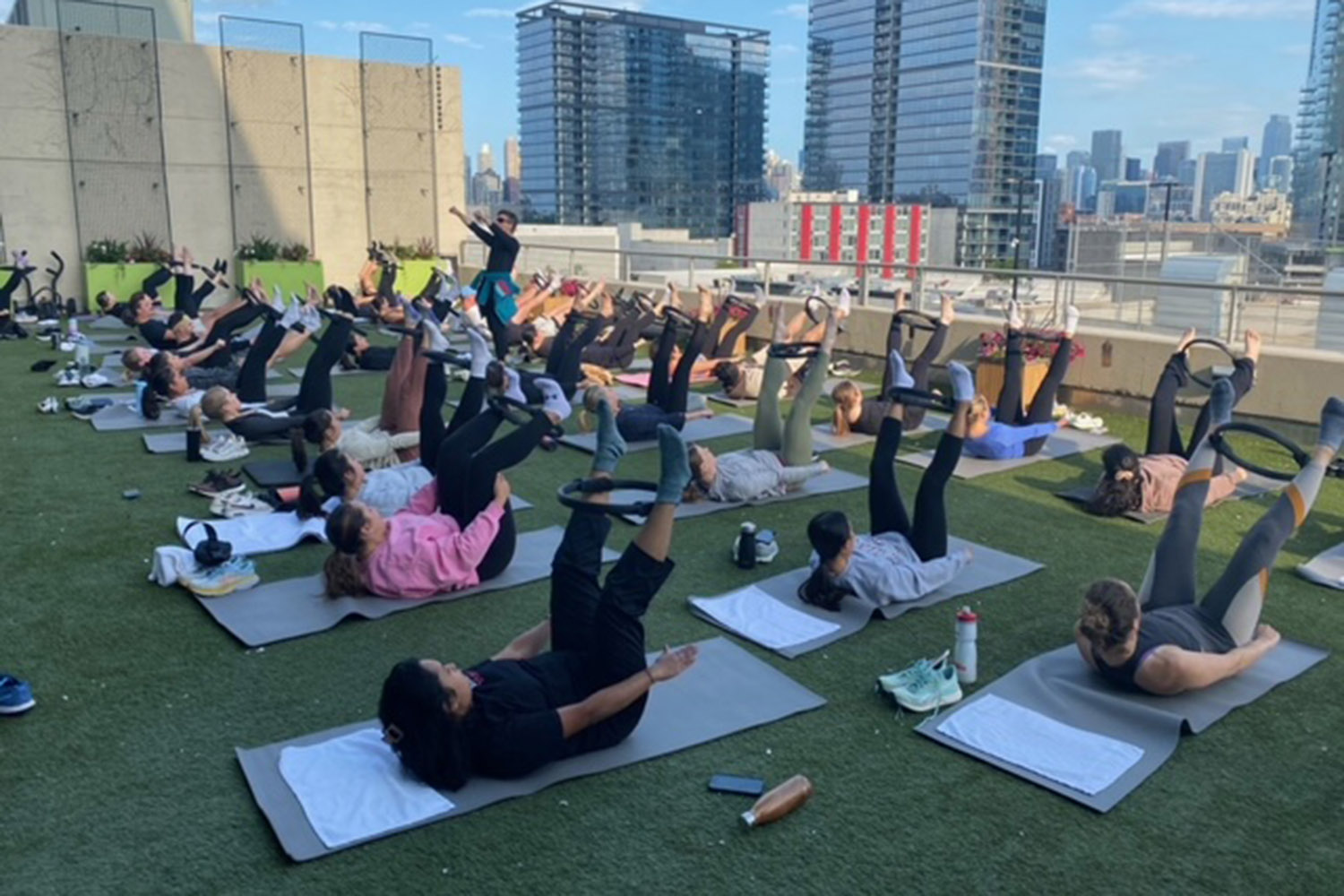 Say Goodbye to Summer: Rooftop Turf Takeover! - Fitness Formula Clubs